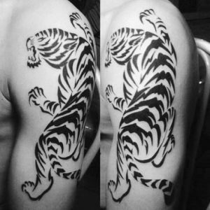 Tatuagem de Tigre: Significado, cuidados e 80 ideias incríveis